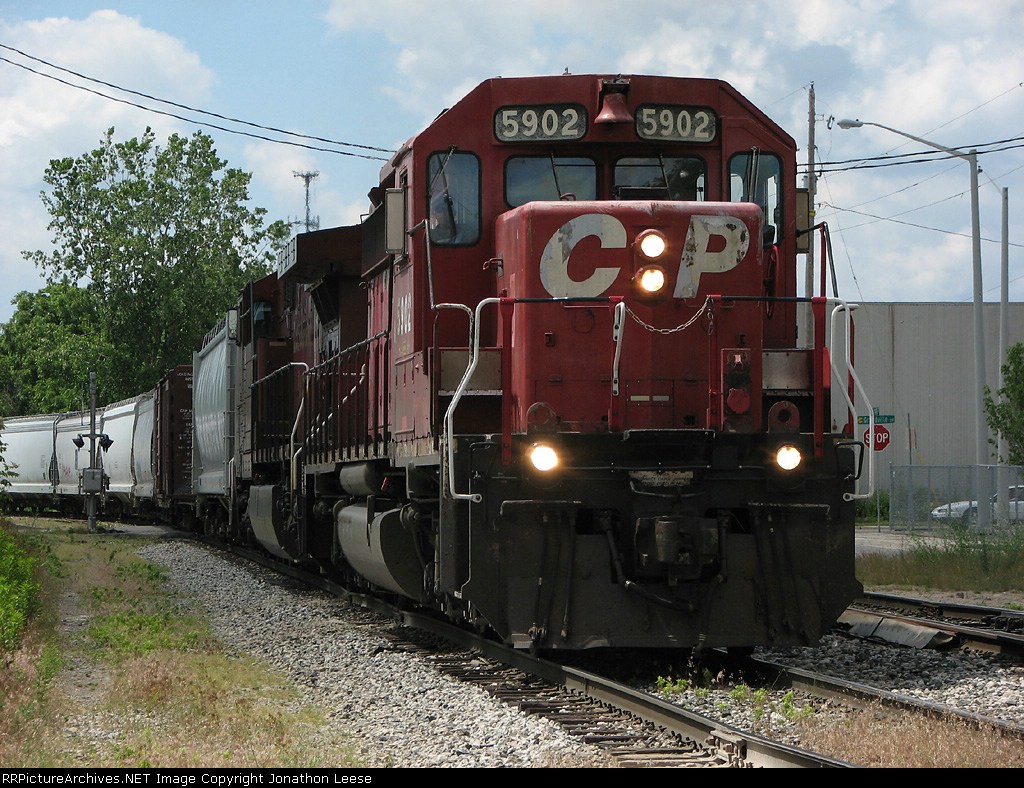 CP 5902 leads X740-23 east across Grandville Ave